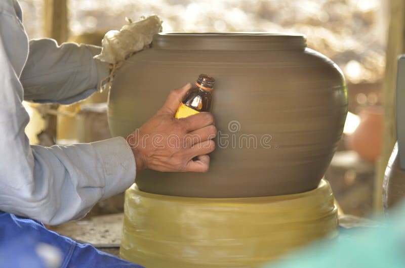 Potter decorated pottery. stock photo. Image of asia - 36500660