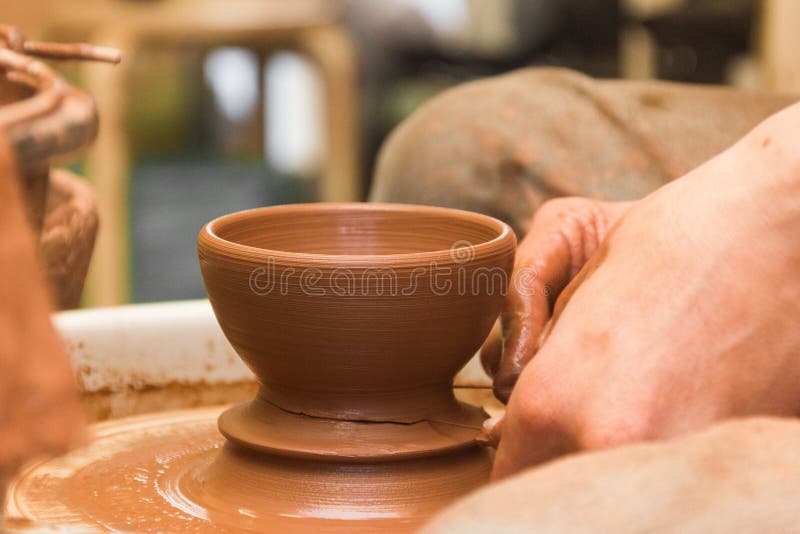 Potter doing his work stock photo. Image of pottery - 102593534