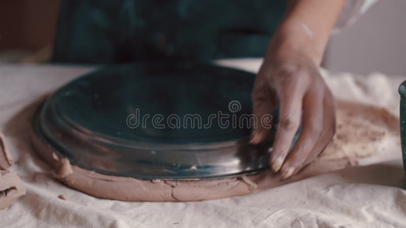 Potter Forming Clay into a Dish by Using a Form and Tools To Get the ...