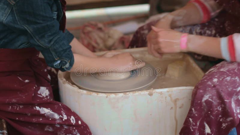 Potter and His Apprentice Make a Pot Out of Clay. Stock Footage - Video ...
