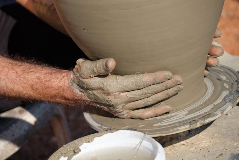 Potter Lifting the Finished Clay Pot Stock Photo - Image of pottery ...