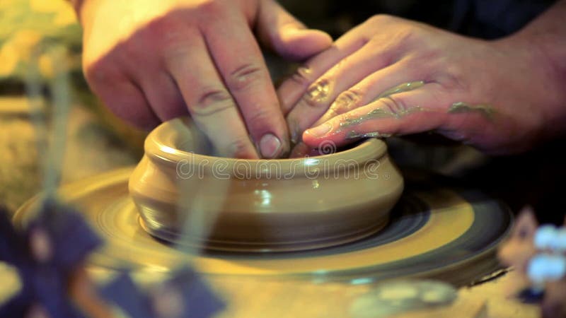 Potter Make Clay Dishes. Master Hands Working on Potters Wheel Stock ...