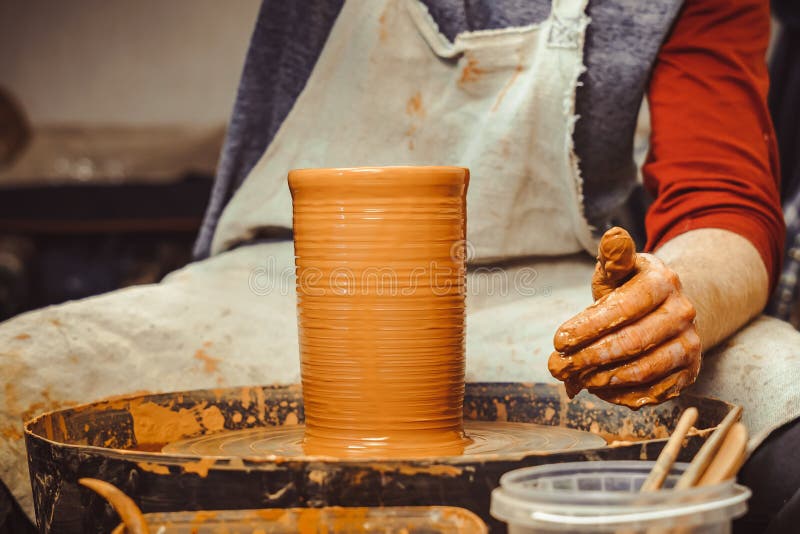 Potter makes a jug stock photo. Image of craft, dirty - 128550142