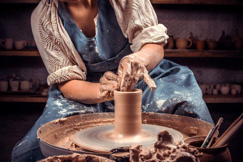 Hands of the Master Potter and Vase of Clay on the Potter& X27;s Wheel ...