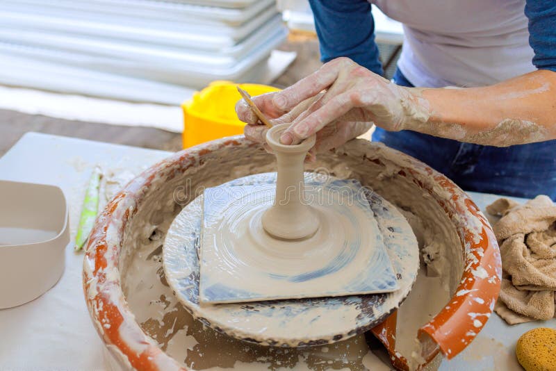 In Potter is Sculpting Soft Clay with Wet Hands while Making Clay ...
