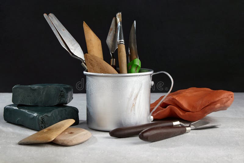 Potter Sculptor Tools and Pieces of Clay and Plasticine on a Light ...