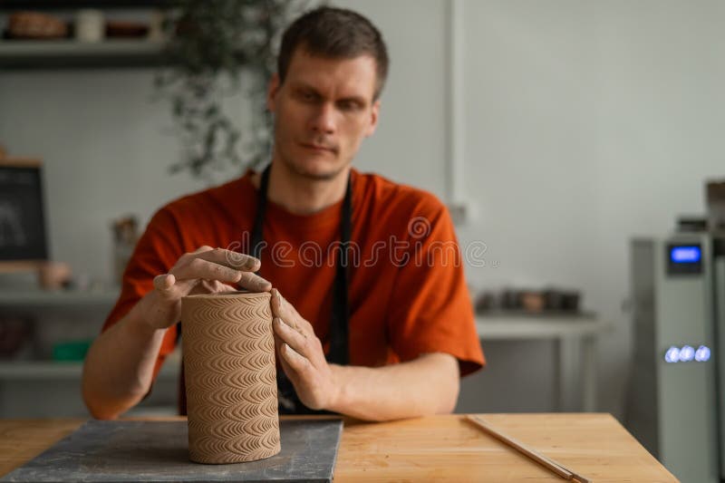 Potter Sculpts a Patterned Cylinder from Clay. Stock Image - Image of ...