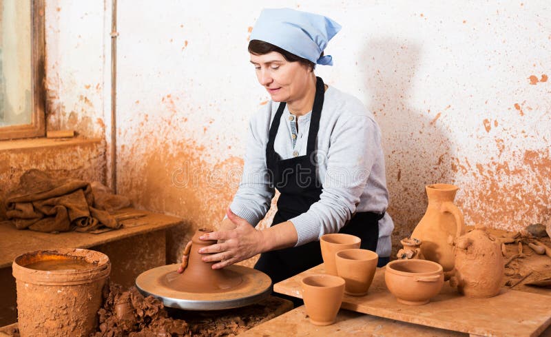Potter at work stock photo. Image of pottery, clayware - 226631516