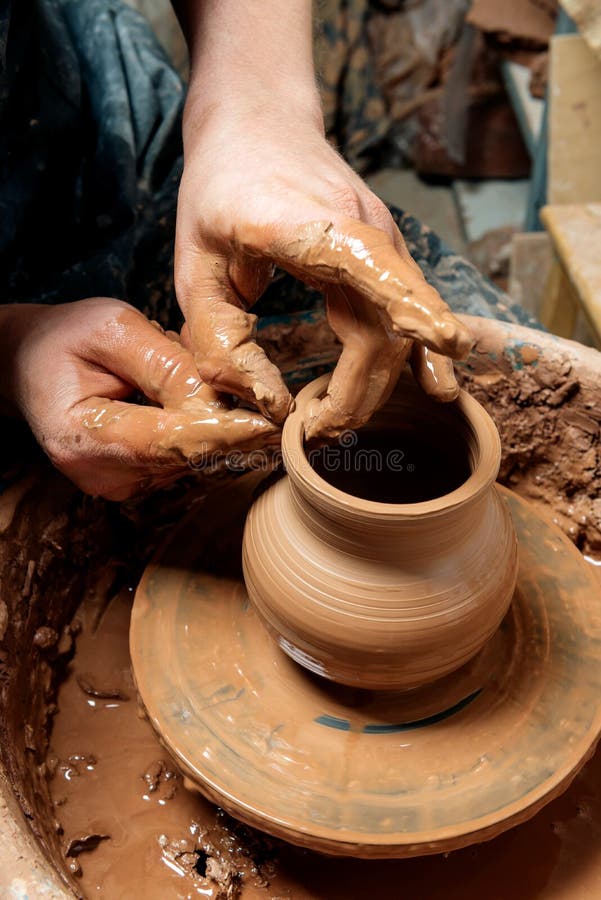Potter at work on clay pot stock image. Image of pottery - 9749015