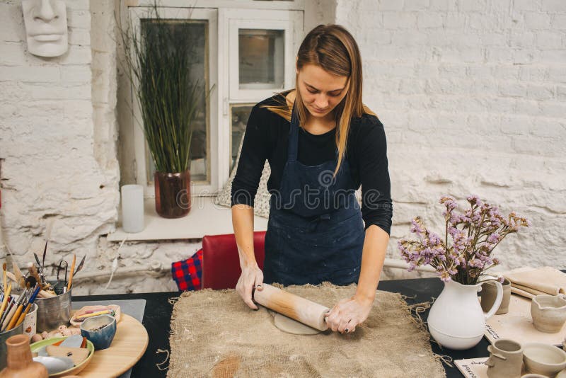 Pottering Process Concept. Two Professional Ceramists or Claymakers ...