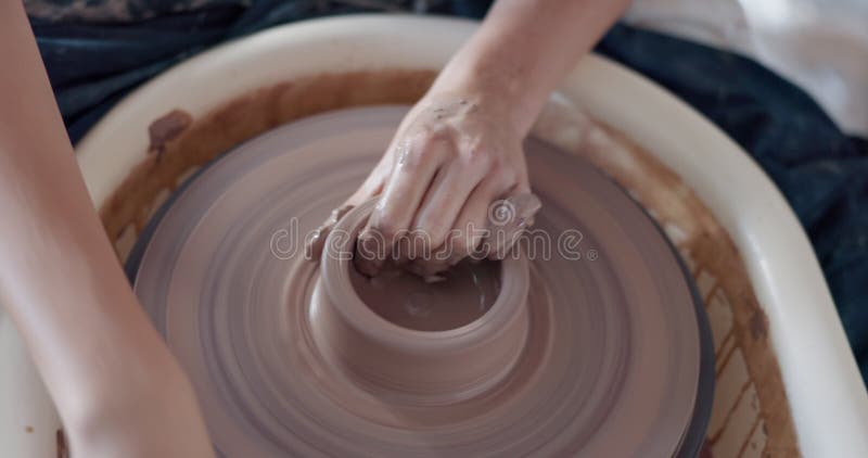 Pottery, Art and Hands on a Potter Wheel with Artist Spinning Clay in ...
