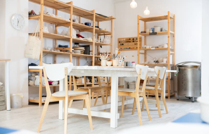 Pottery Art Studio with Wooden Shelves and Table Stock Image - Image of ...