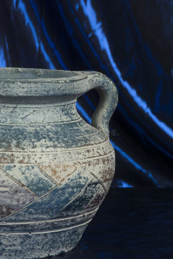 Pottery on blue background stock photo. Image of blue - 273250290