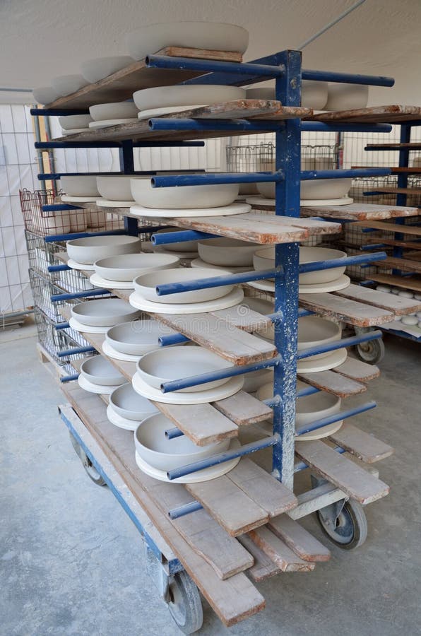 Pottery bowls on rack stock photo. Image of manufacture - 259621522