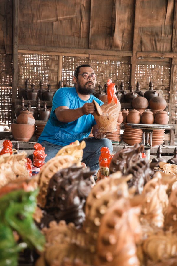 Pottery Maker Looking at Product Stock Photo - Image of clay, preparing ...