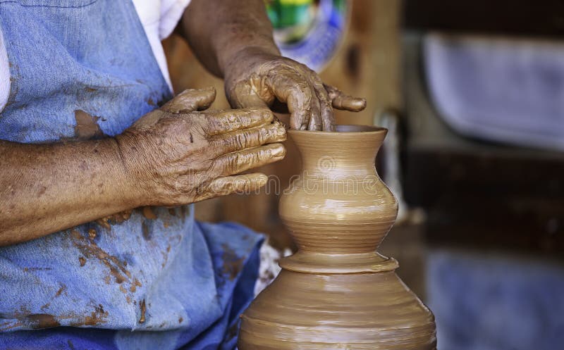 Making traditional pottery stock photo. Image of flower - 17588000