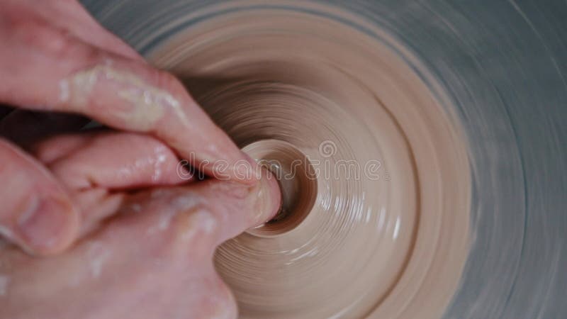 Pottery - the Master is Continuing To Spin Clay on the Wheel Stock ...