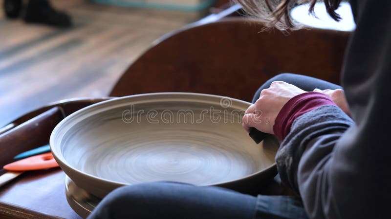 Pottery Polishing Process with 2 Hands in the Final Step. Stock Footage ...