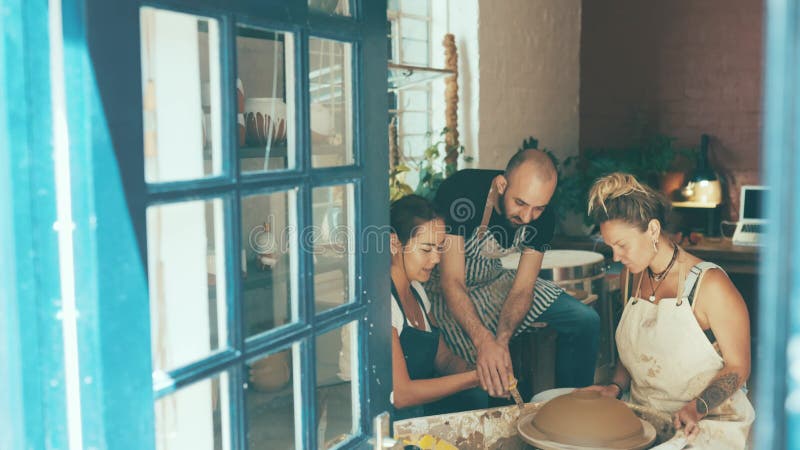 Pottery Wheel, Class or Man Teaching Workshop Skill, Sculpture Design or Teamwork on ...