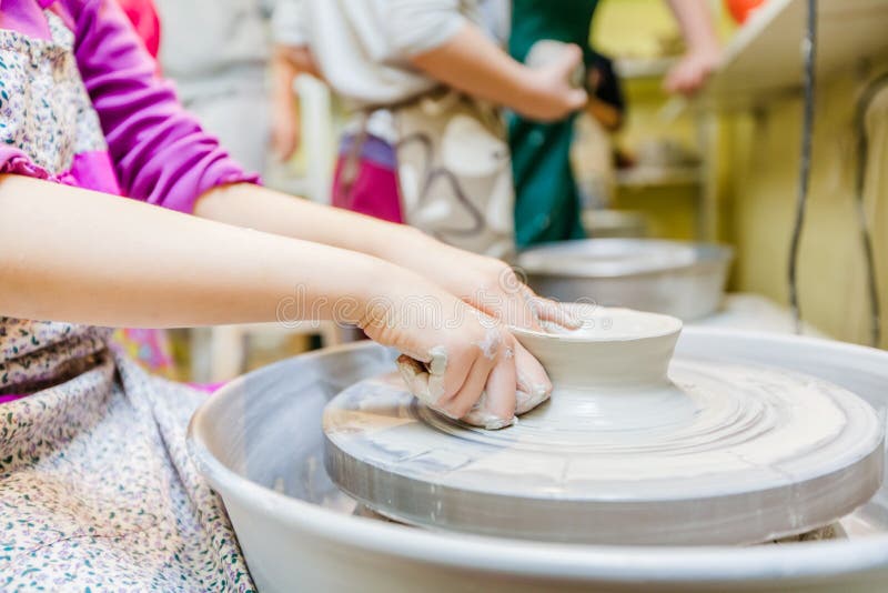 Child Hands Shaping Clay at Wheel Stock Image - Image of making, lesson ...