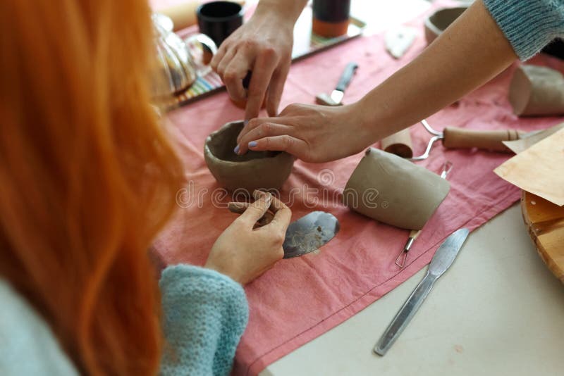 Pottery Workshop Class. a Pottery Crafts Dish from a Raw Clay Stock ...