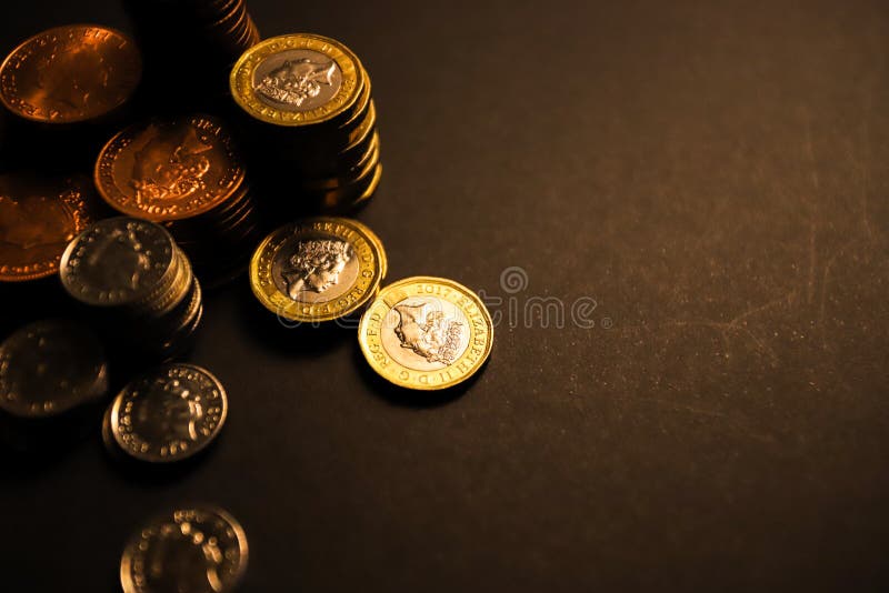 Pound Coins on Black Background Editorial Photo - Image of background ...