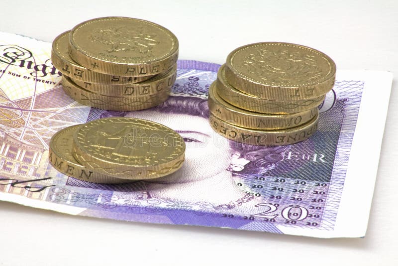 Pound Coins And Twenty Quid Stock Photo - Image of bank, coins: 7945386