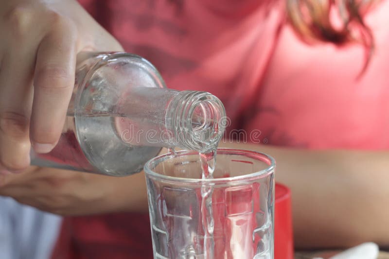 Pour drinking water stock photo. Image of pour, throat - 96021558