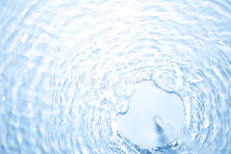Pour Hits the Surface of the Water Stock Photo - Image of fluid, moment ...
