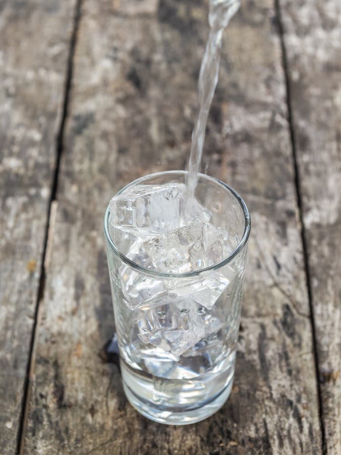Pour Water into a Glass of Ice Stock Image - Image of cool, refreshment ...