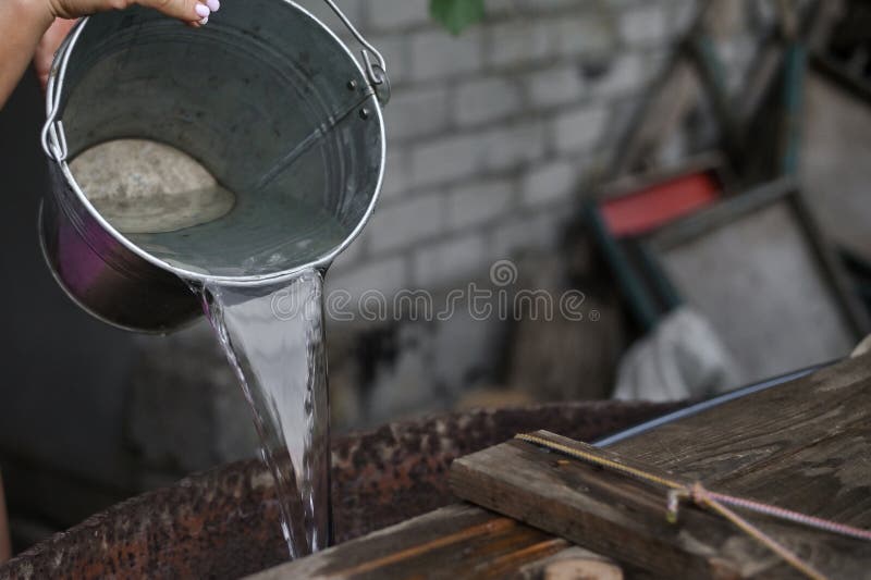 Pour the Water Out of the Bucket Stock Image - Image of colours, flow ...