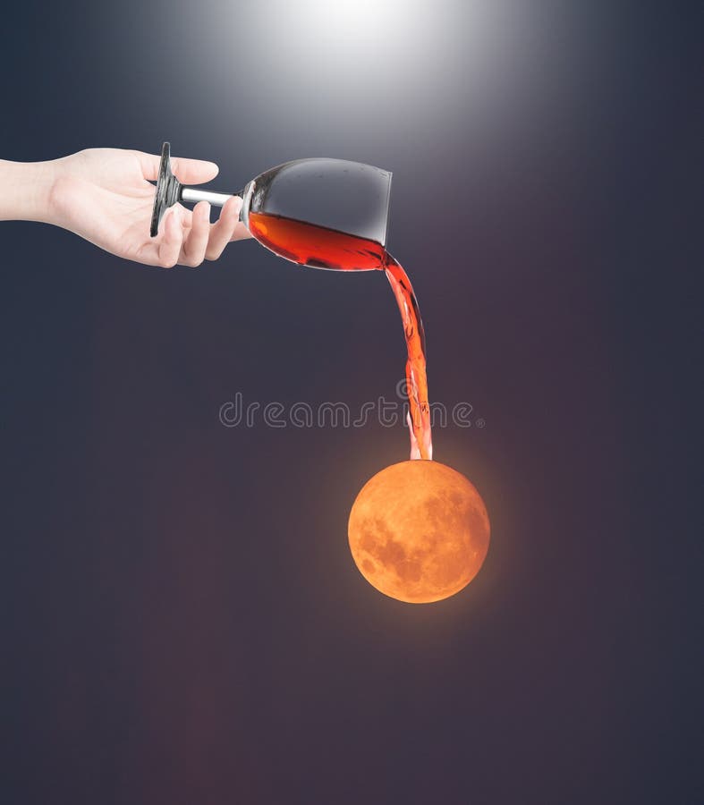 Pour the Wine from the Glass Onto the Red Moon. Stock Photo - Image of ...