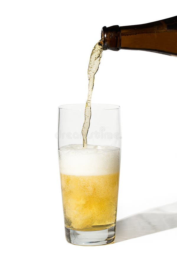 Pouring beer from a bottle stock image. Image of high - 59316875