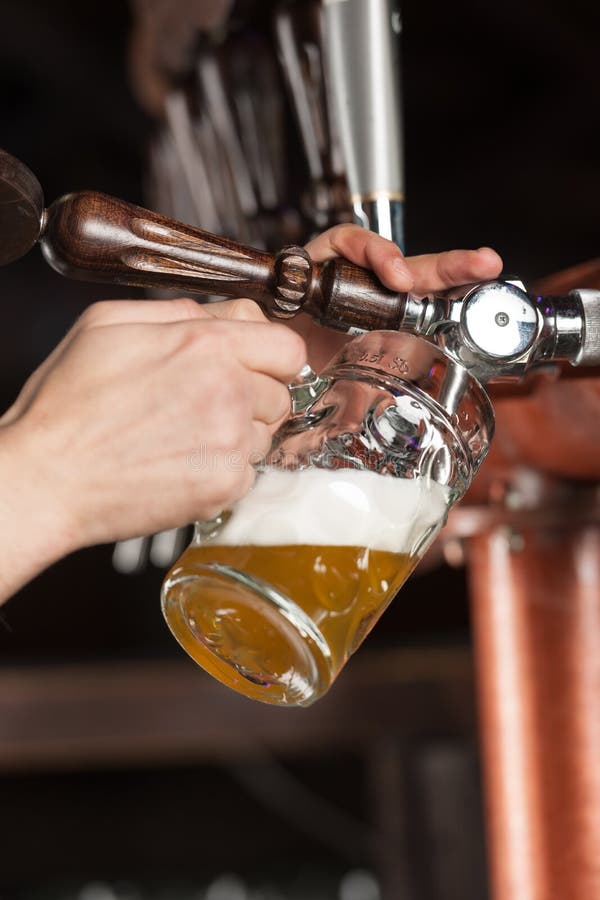 Filling beer glass and tap stock photo. Image of details - 15860098