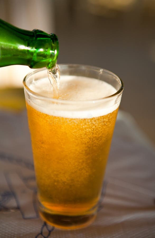 Pouring beer stock photo. Image of blue, drop, pouring - 5000172