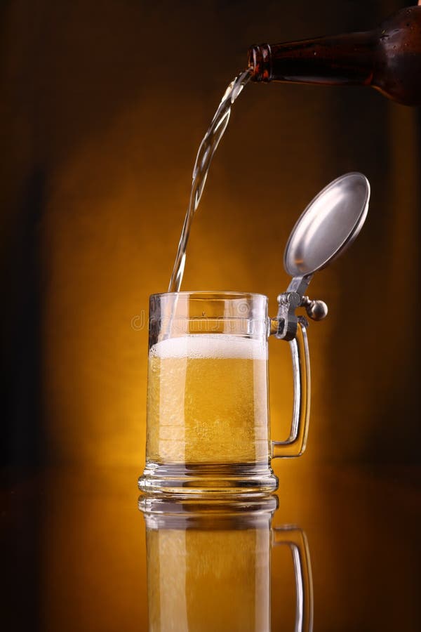 Pouring beer stock photo. Image of drapery, warm, pilsner - 42409878