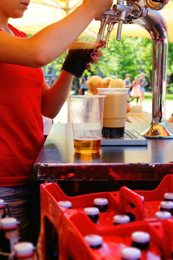 Pouring Beer from Tap stock photo. Image of draft, foamy - 74649048