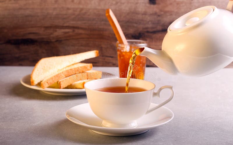 Pouring Black Tea in To Transparent Glass Stock Photo - Image of ...