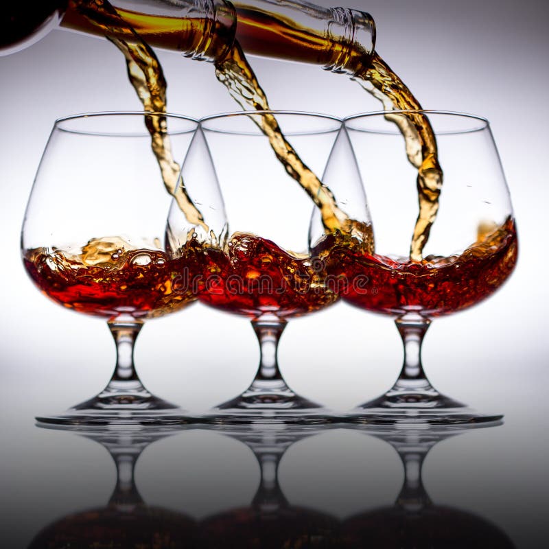 Pouring Brandy into a Glass Stock Image - Image of bouquet, dishes ...