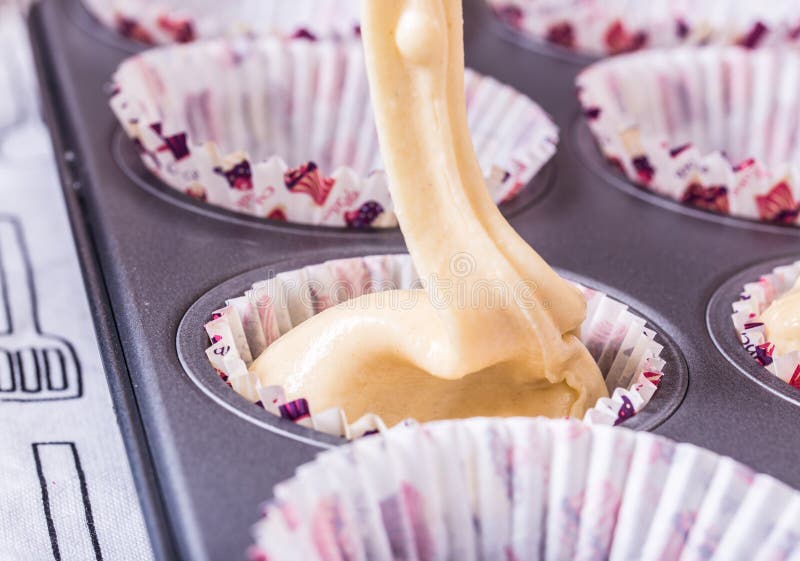 Pouring the cake mix stock image. Image of group, brown - 41202065
