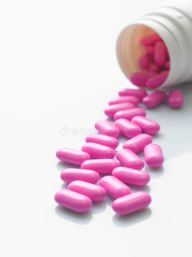 Pouring capsules stock image. Image of healthcare, bottle - 18989941