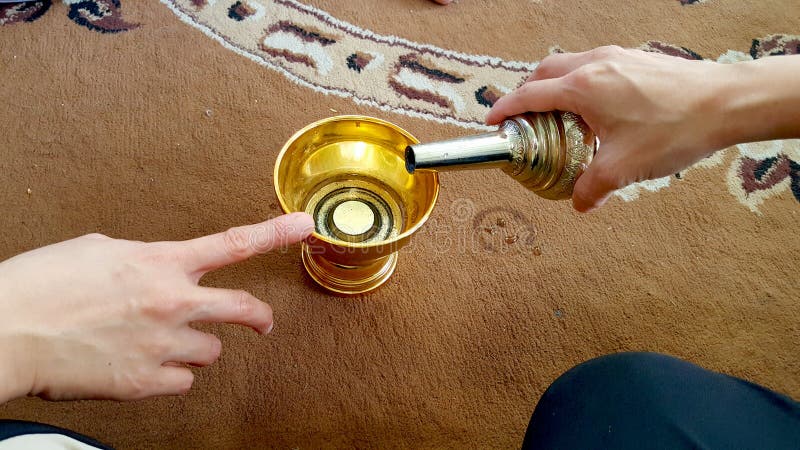 Pouring Ceremonial Water into the Container Stock Image - Image of ...