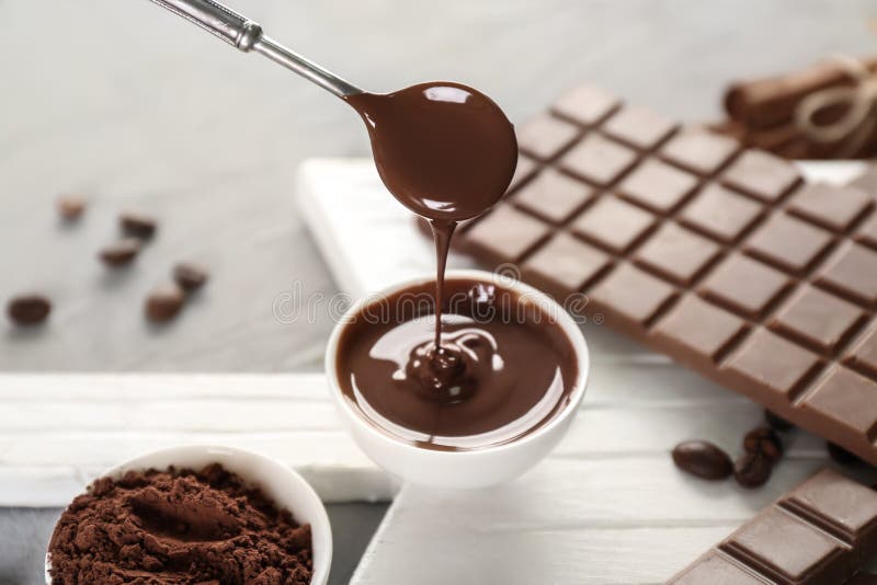 Pouring Chocolate into Bowl on Table Stock Image - Image of chocolate ...