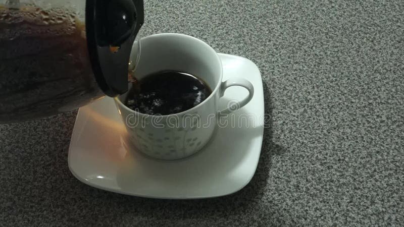 Pouring Hot Coffee Over Vanilla Ice Cream To Make Affogato Dessert ...