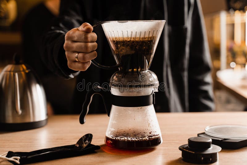 Pouring Coffee in Pot from Clever Dripper with Pour Over Filter in Cafe ...