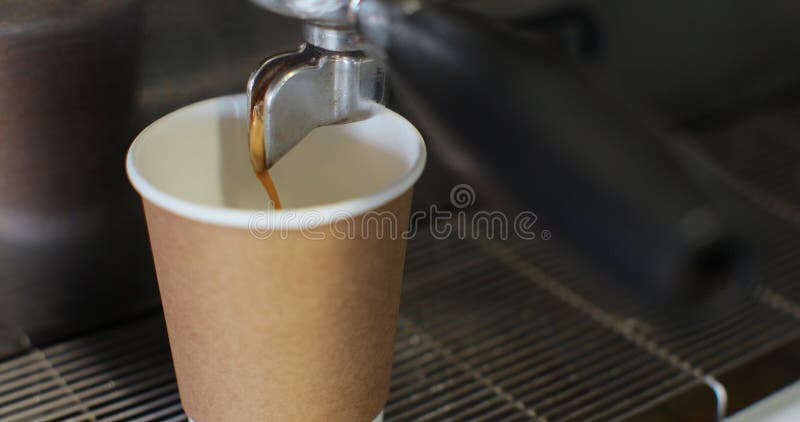 Pouring Coffee Stream from Machine in Cup. Flowing Fresh Ground Coffee ...
