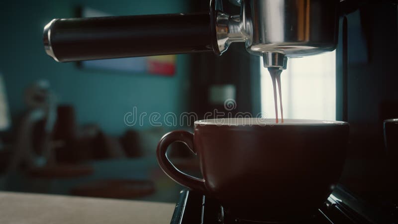 Pouring Coffee Stream from Machine in Cup. Home Making Hot Espresso ...