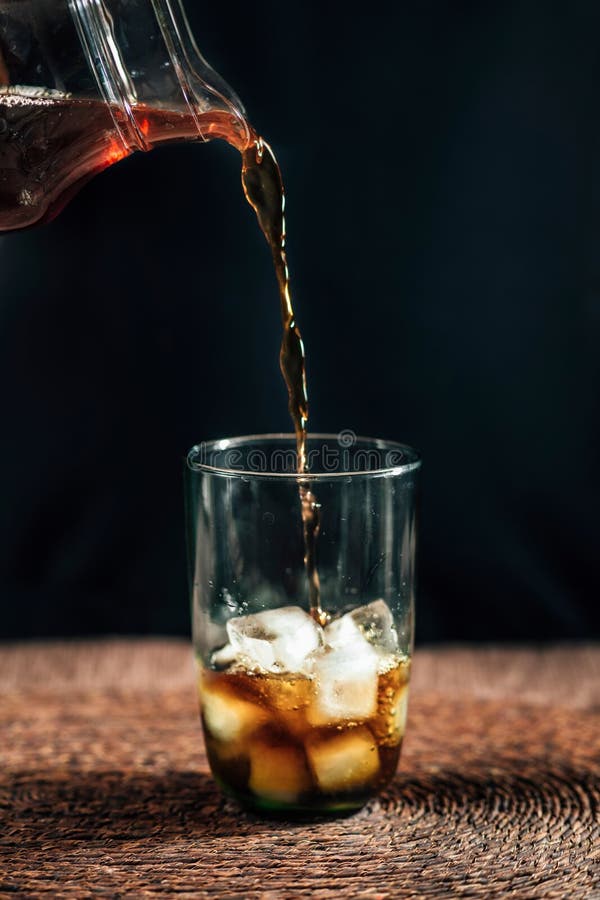 Pouring Cold Brew Coffee stock image. Image of drink - 191285389