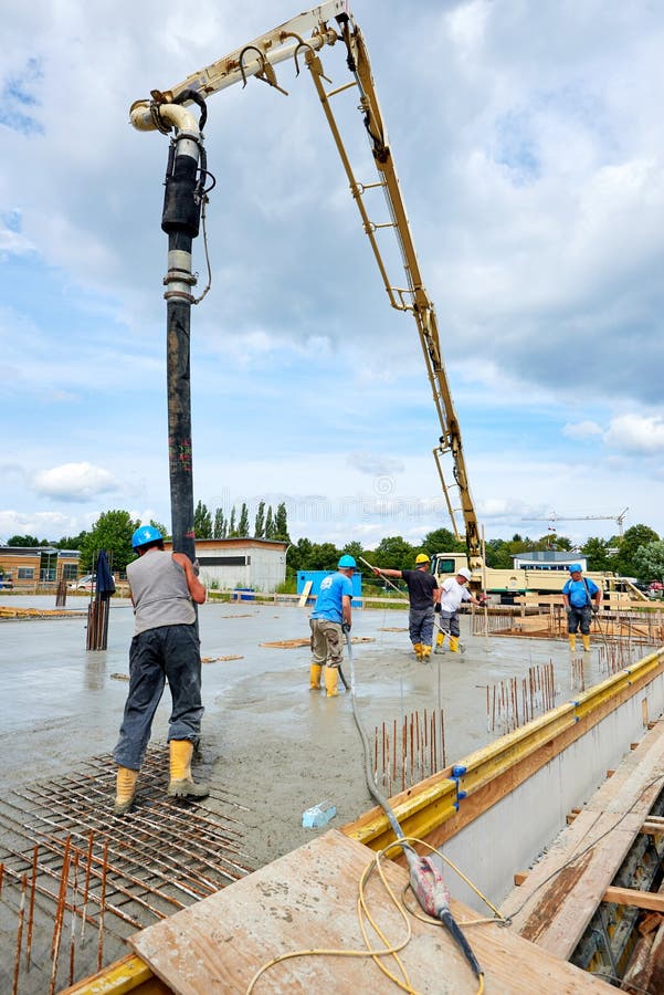 Pouring concrete editorial stock image. Image of contractor - 83447204
