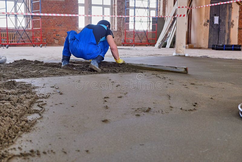 Pouring the concrete floor editorial stock image. Image of floor - 88587274